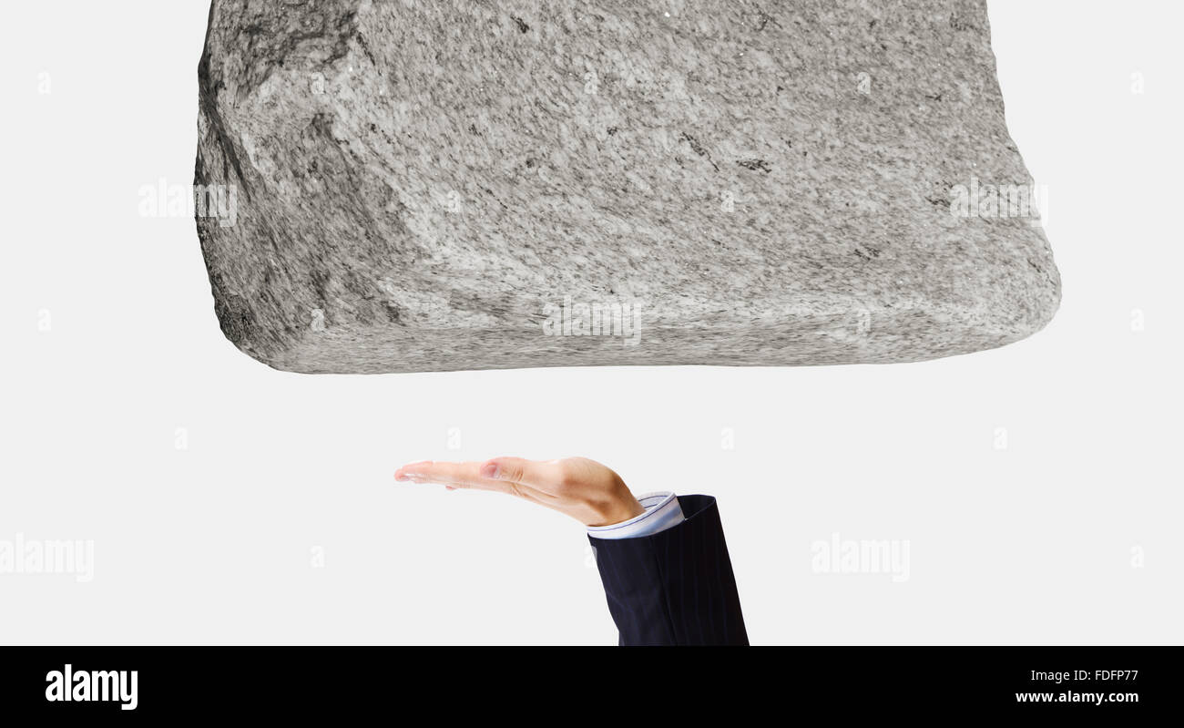 Man pushing rock uphill hi-res stock photography and images - Alamy