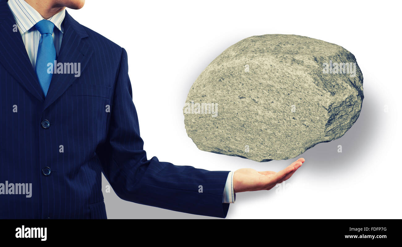 Man pushing rock uphill hi-res stock photography and images - Alamy