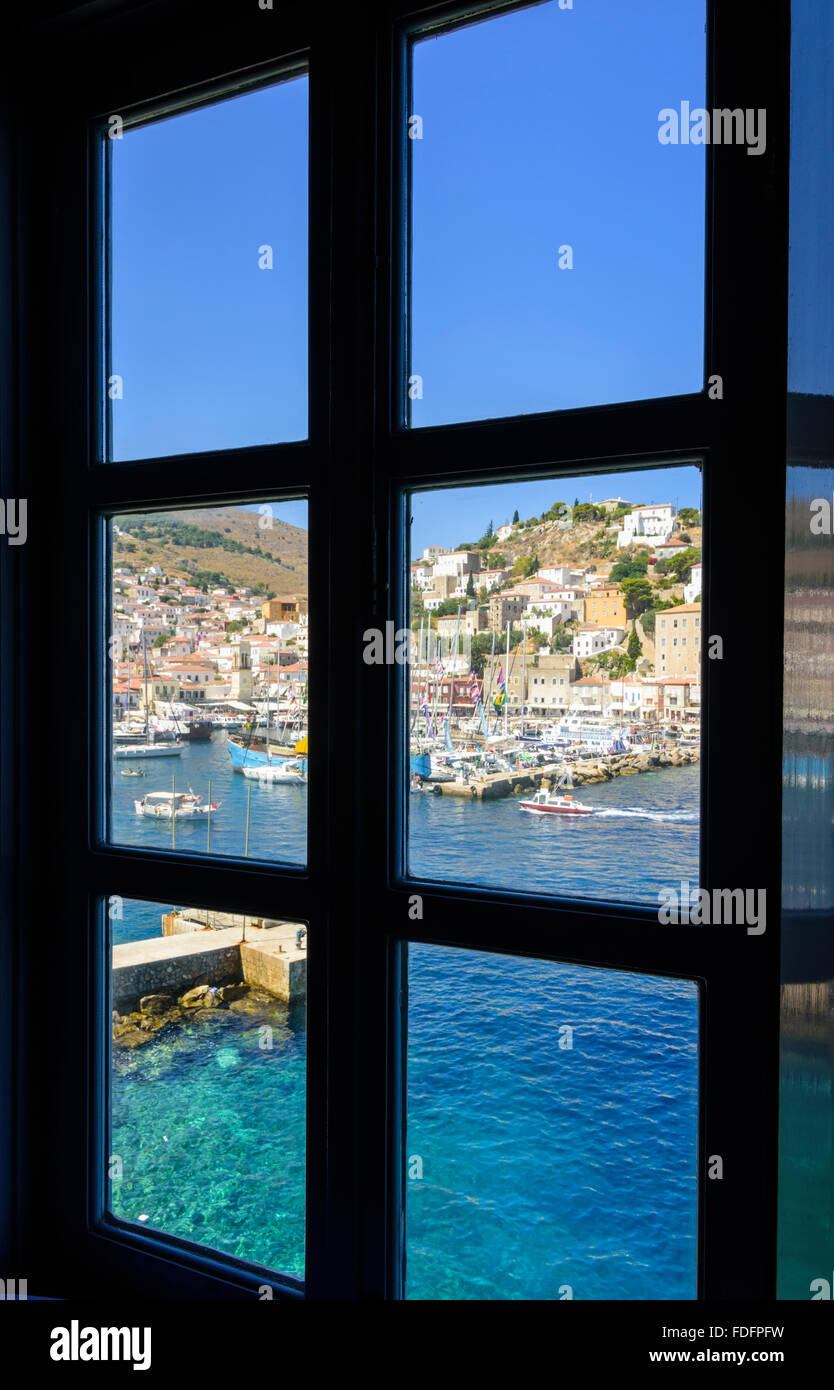 Hydra Town harbour and hill views through a window, Hydra Island ...