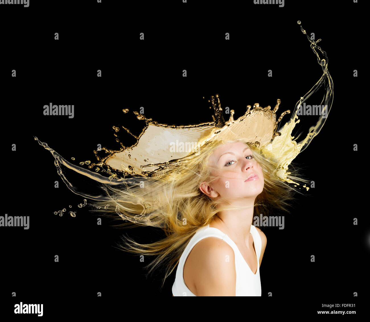 Young attractive blond girl with hair in color splashes Stock Photo - Alamy