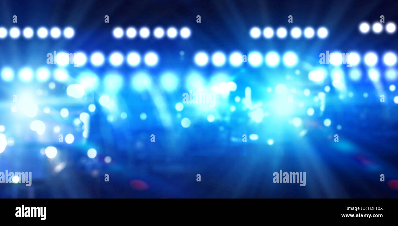 Background image of stage in color lights Stock Photo - Alamy