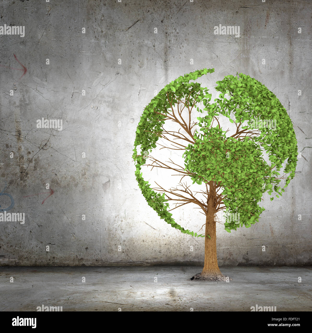 Young businesswoman cutting tree with scissors in shape of Earth planet ...