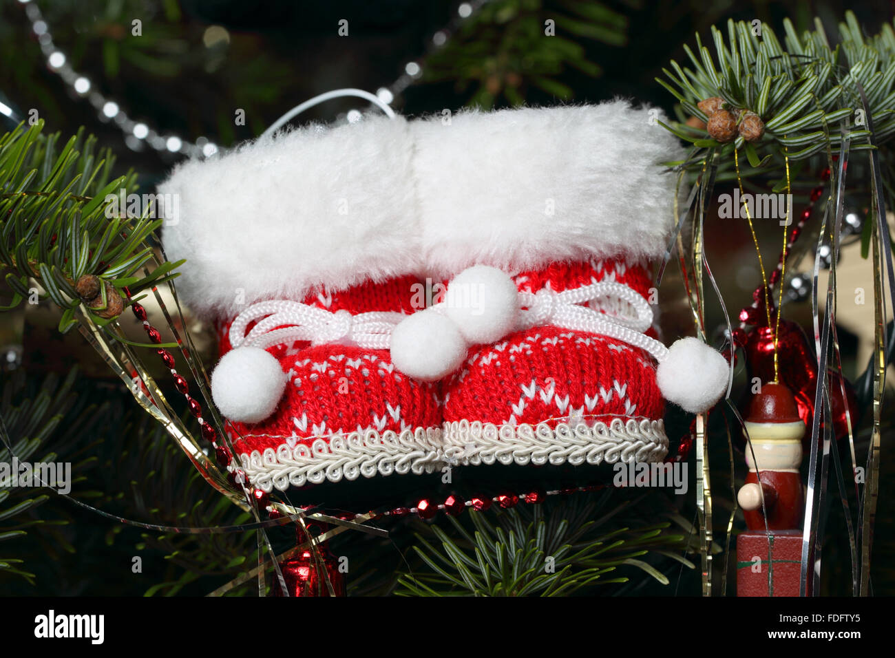 Christmas boots on a tree Stock Photo - Alamy