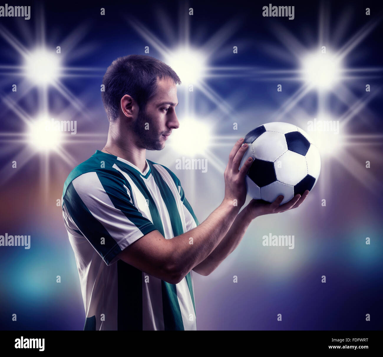 Football-player with a ball Stock Photo - Alamy