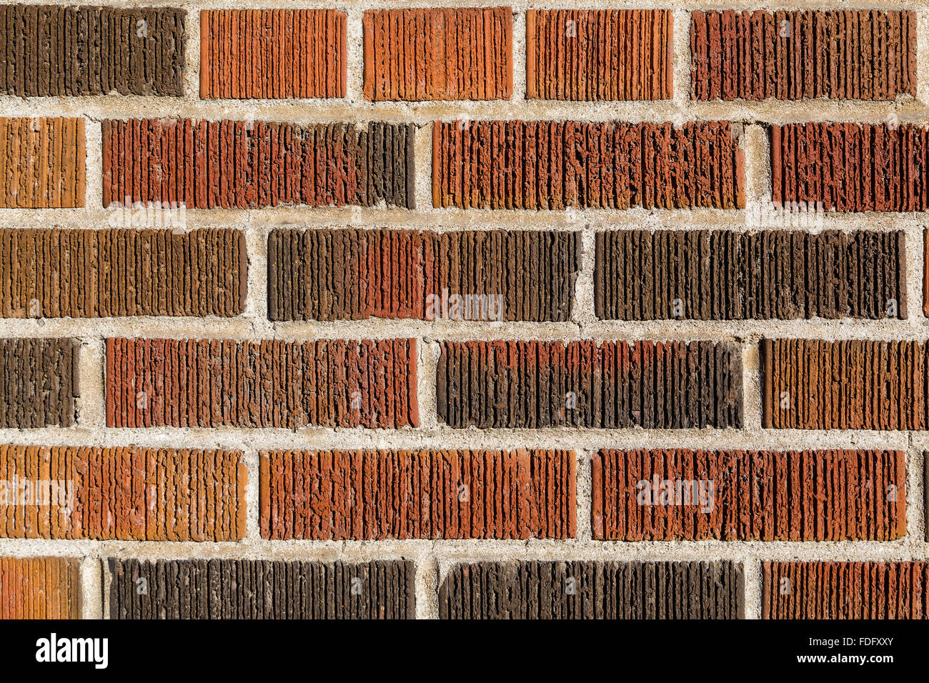 Multi coloured brick wall background and texture. Different bricks can ...