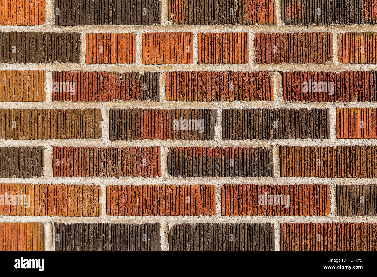 Multi coloured brick wall background and texture. Different bricks can ...