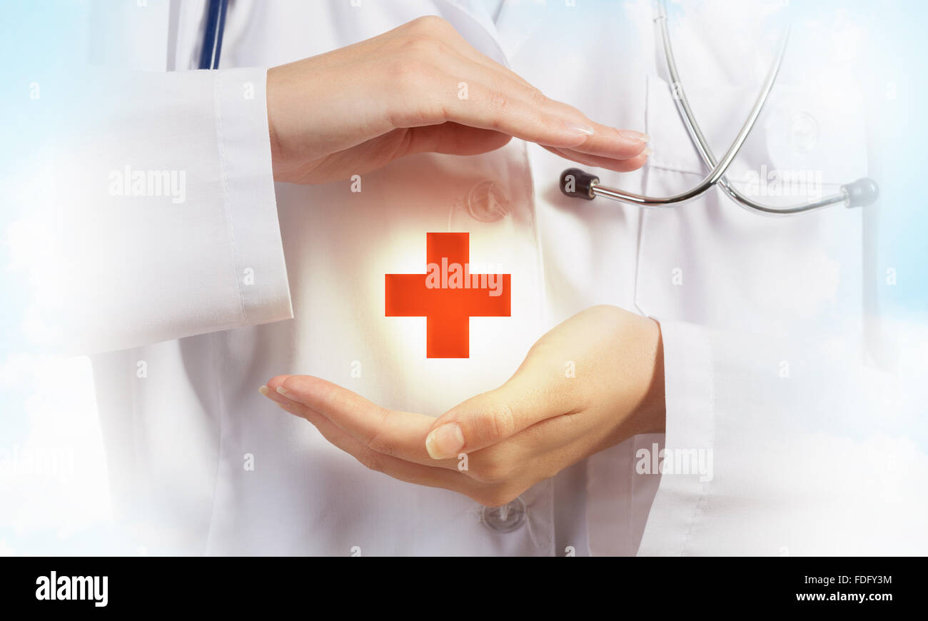 Close up of doctor hands with medicine cross sign Stock Photo - Alamy
