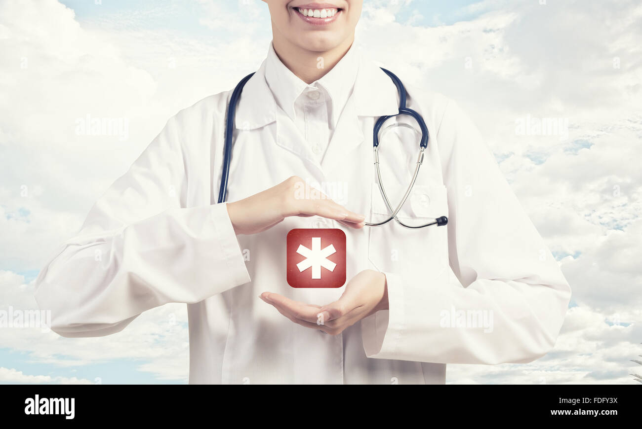 Close up of doctor hands with medicine cross sign Stock Photo - Alamy