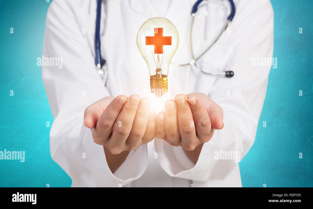 Close up of doctor hands with medicine cross sign Stock Photo - Alamy
