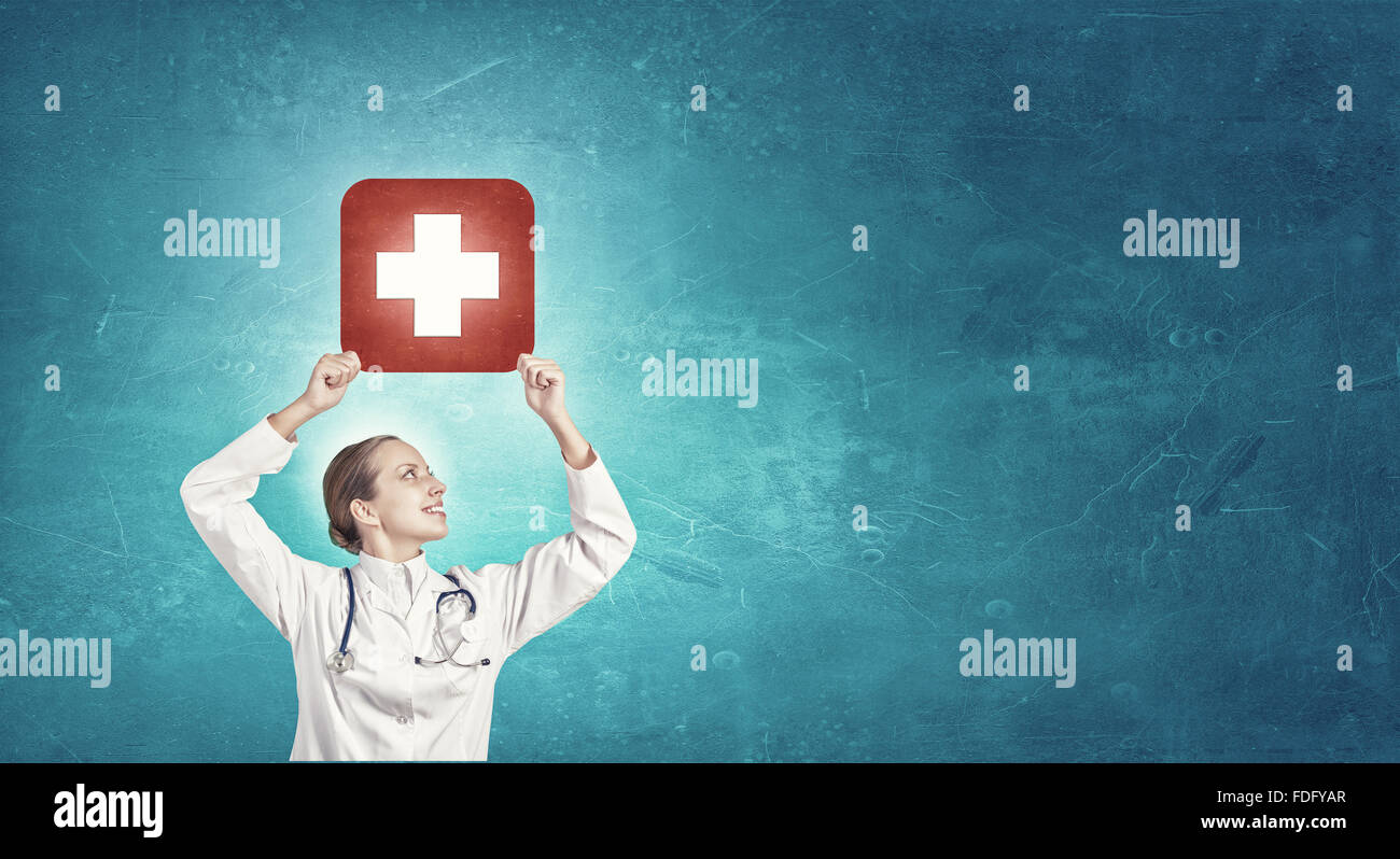 Close up of doctor hands with medicine cross sign Stock Photo - Alamy