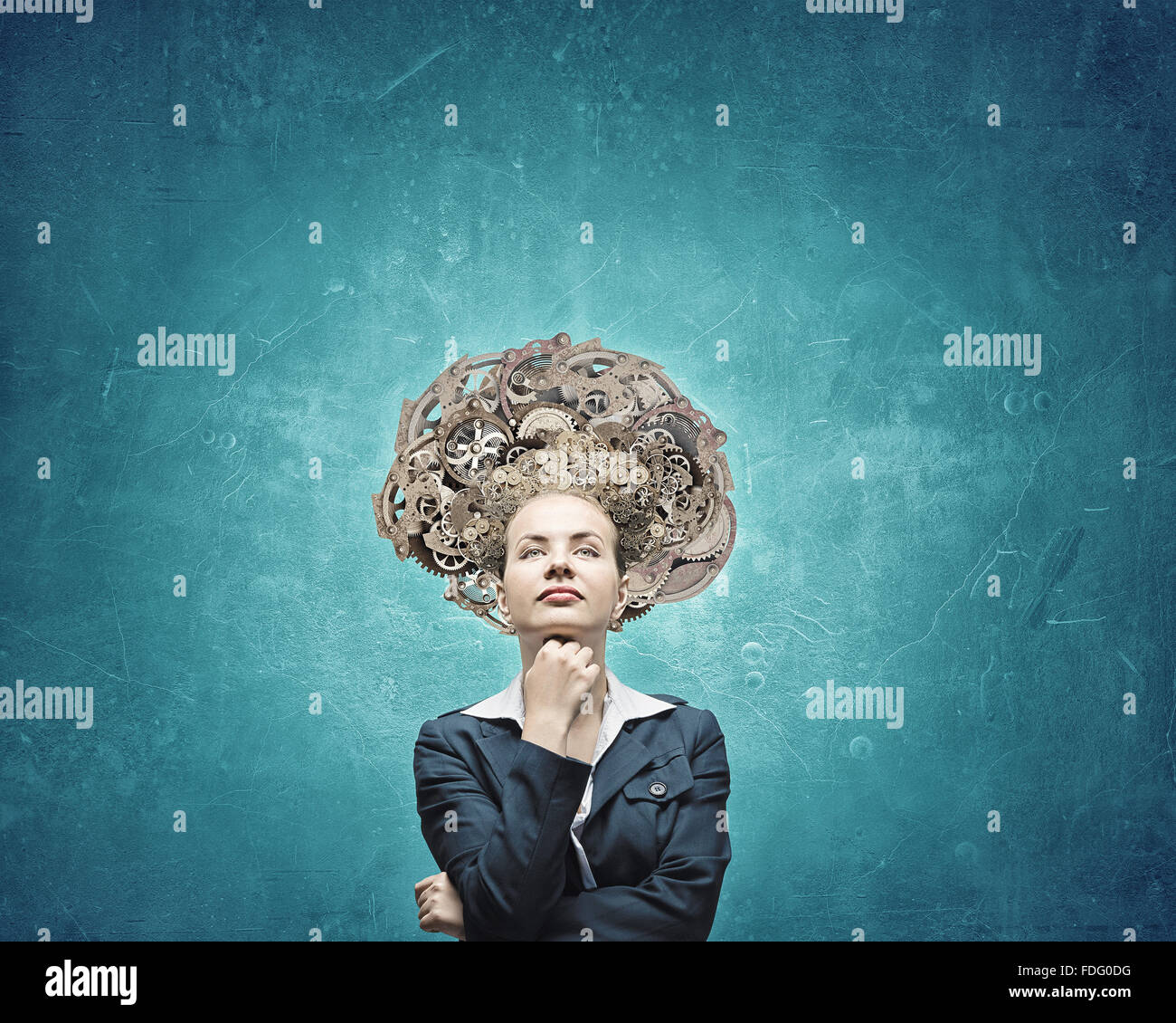 Thinking businesswoman with gear mechanisms on her head Stock Photo - Alamy