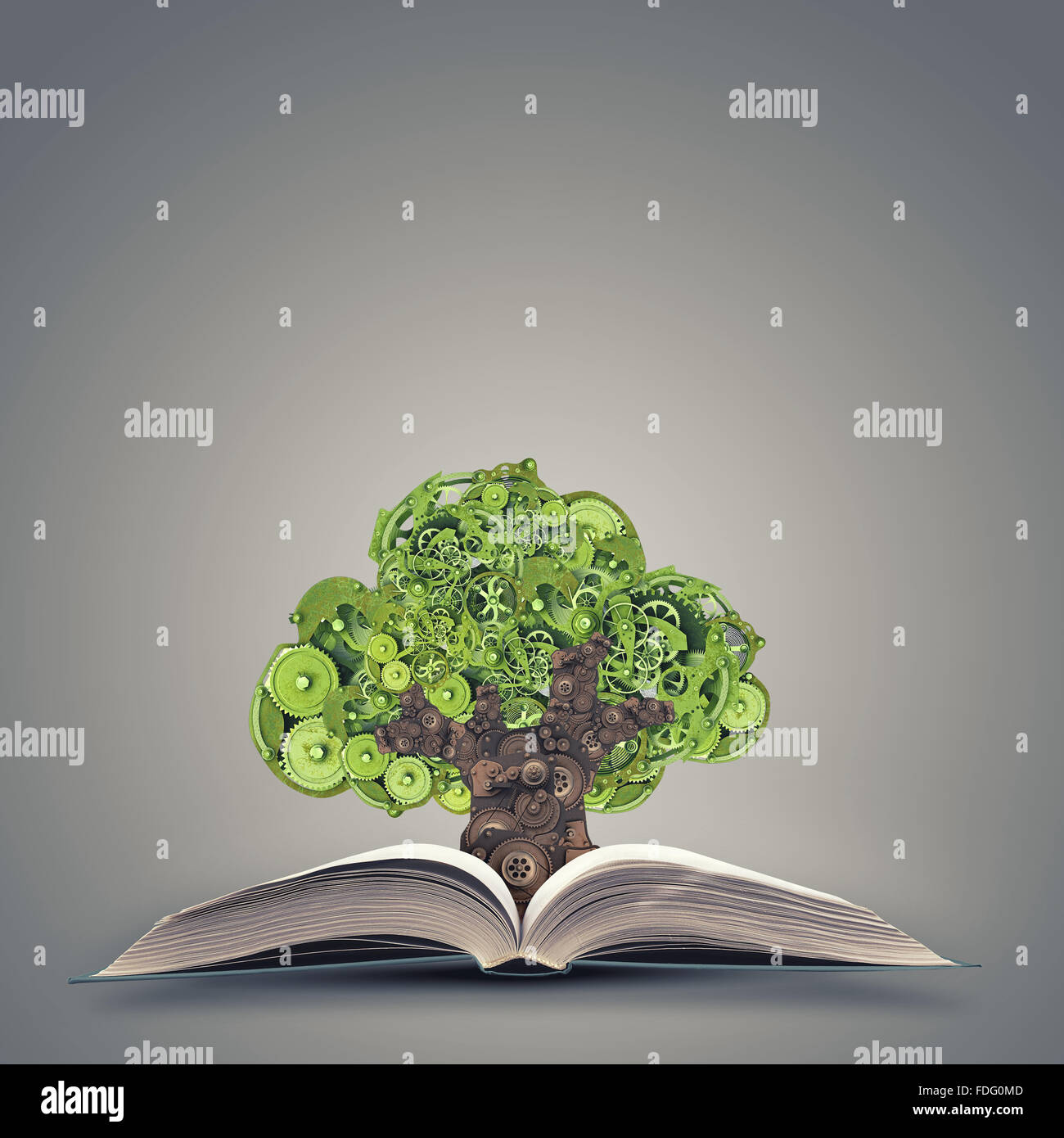 Green concept with tree made of gears growing from book Stock Photo - Alamy