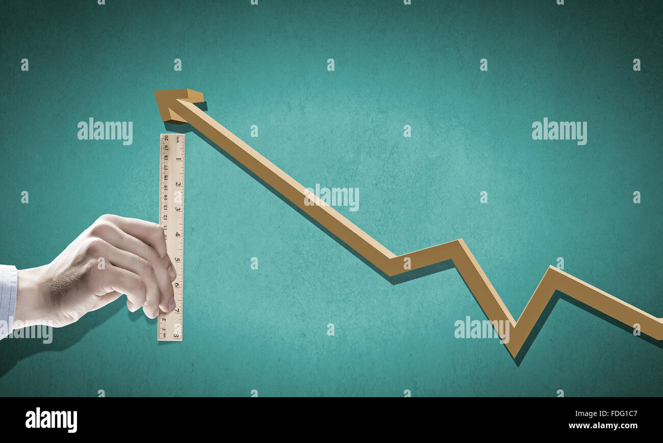 Close up of male hand measuring graph with ruler Stock Photo - Alamy
