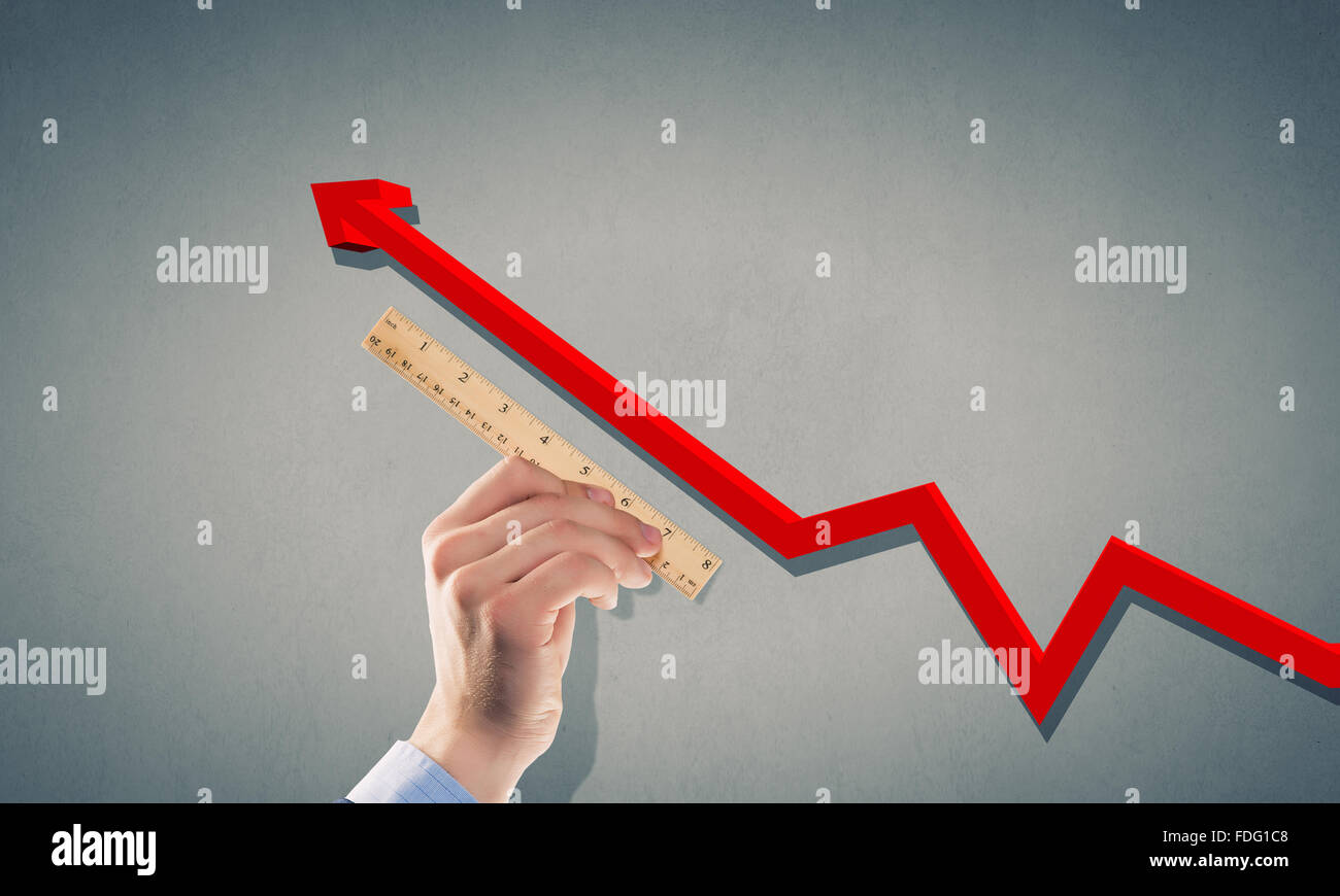 Close up of male hand measuring graph with ruler Stock Photo - Alamy
