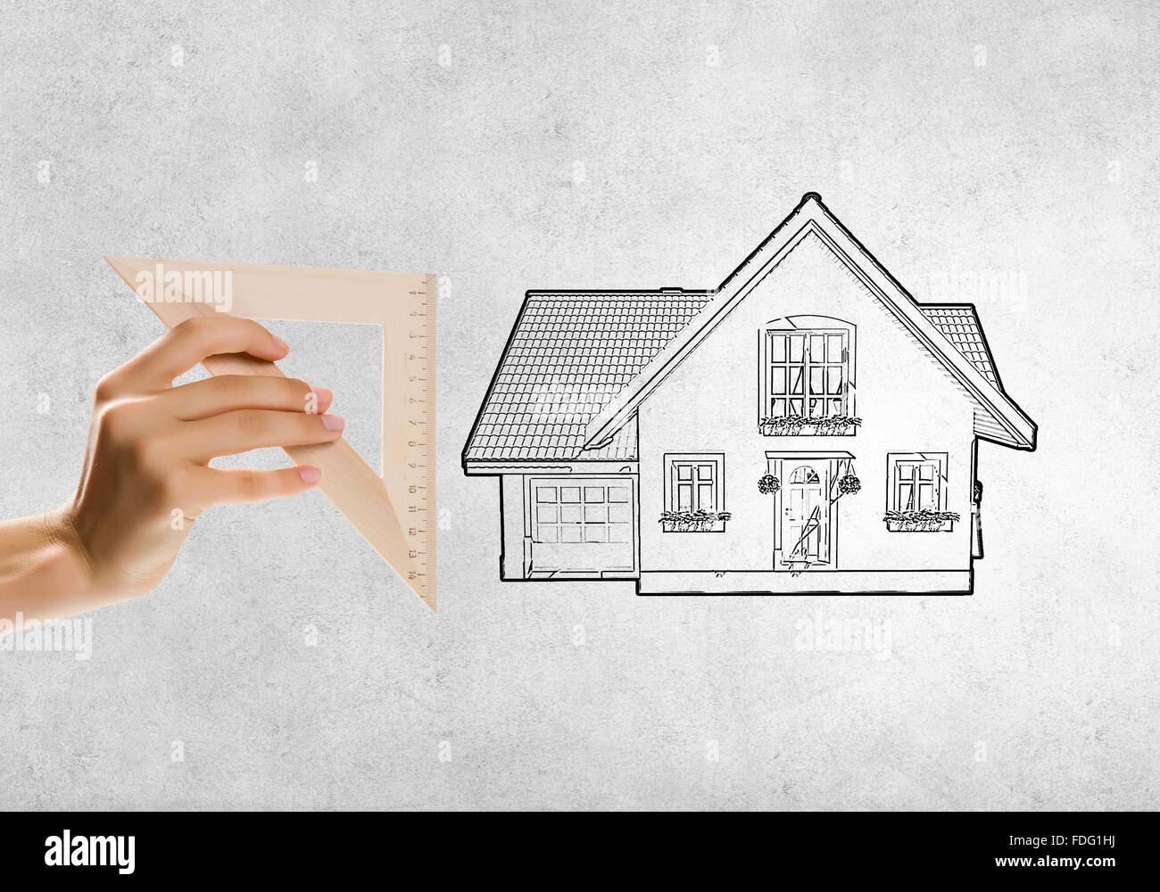Close up of people hands measuring house model with ruler Stock Photo ...