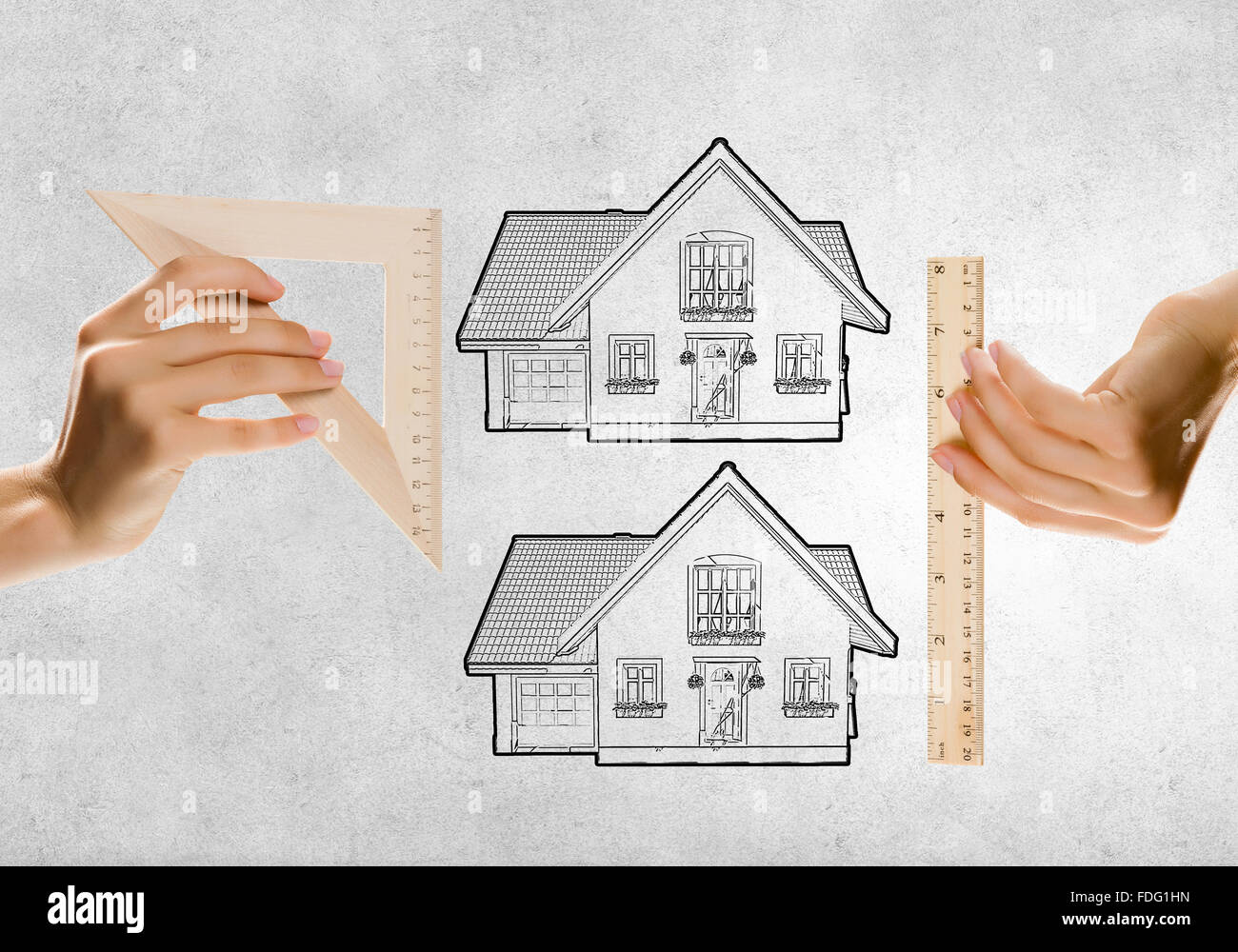 Close up of people hands measuring house model with ruler Stock Photo ...