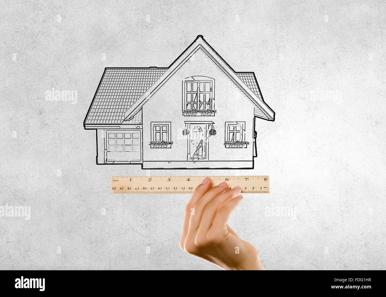 Close up of people hands measuring house model with ruler Stock Photo ...