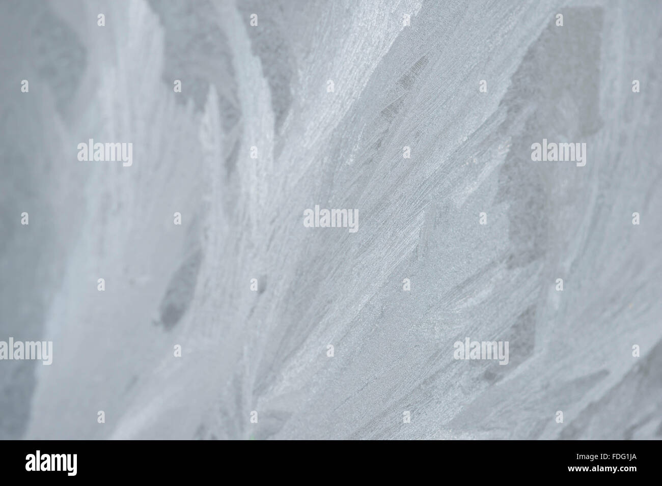 Frozen window glass with frost patterns Stock Photo - Alamy