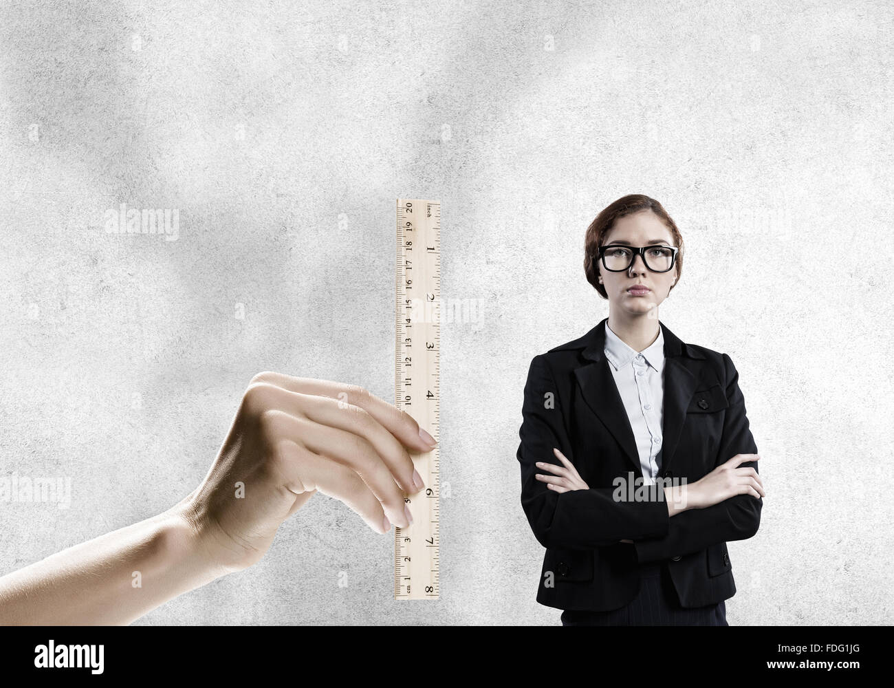 People hands measuring businesswoman with wooden rulers Stock Photo - Alamy