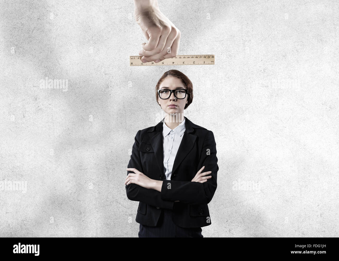People hands measuring businesswoman with wooden rulers Stock Photo - Alamy