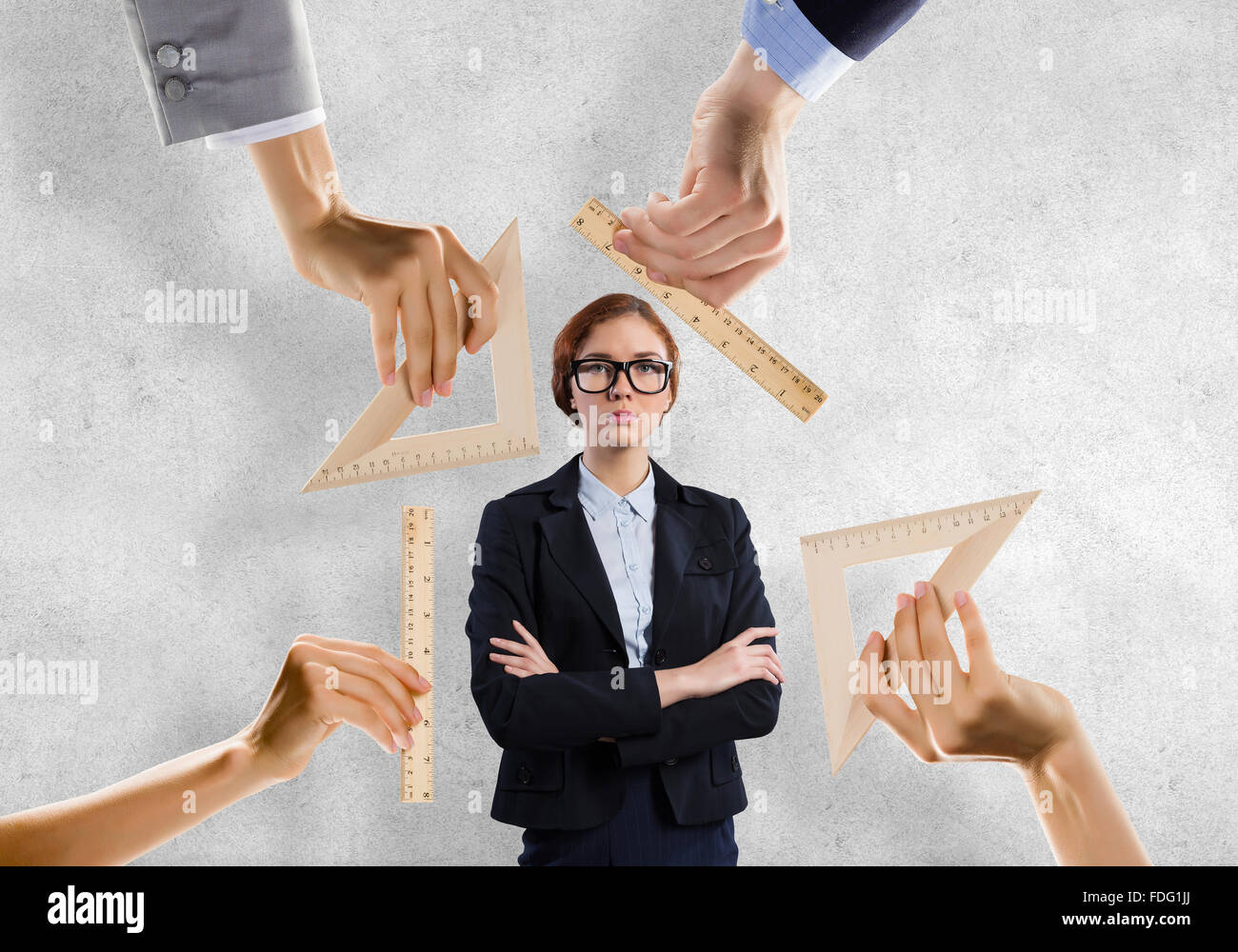 People hands measuring businesswoman with wooden rulers Stock Photo - Alamy