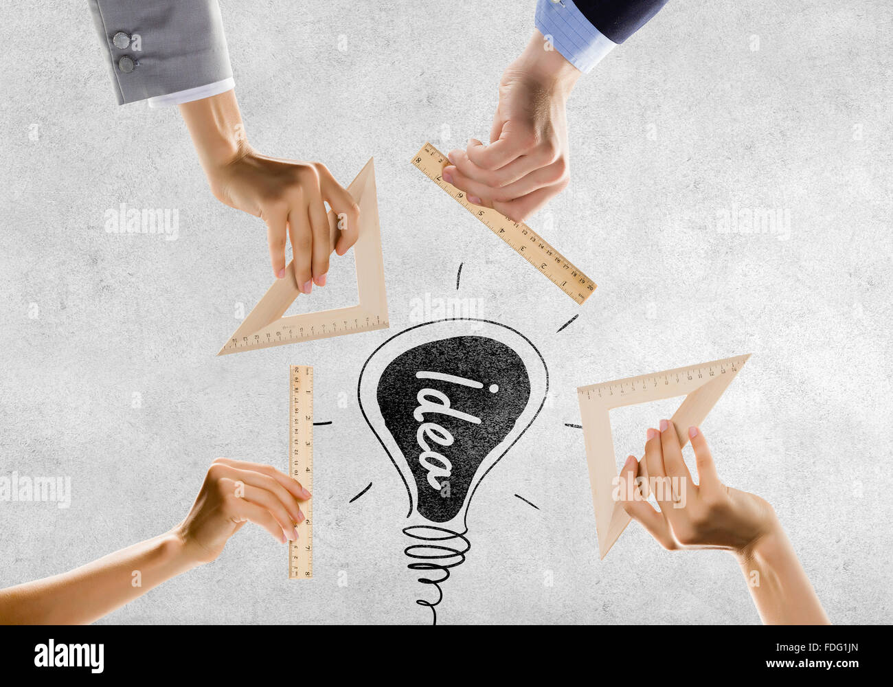 Close up of people hands measuring ight bulb with ruler Stock Photo - Alamy