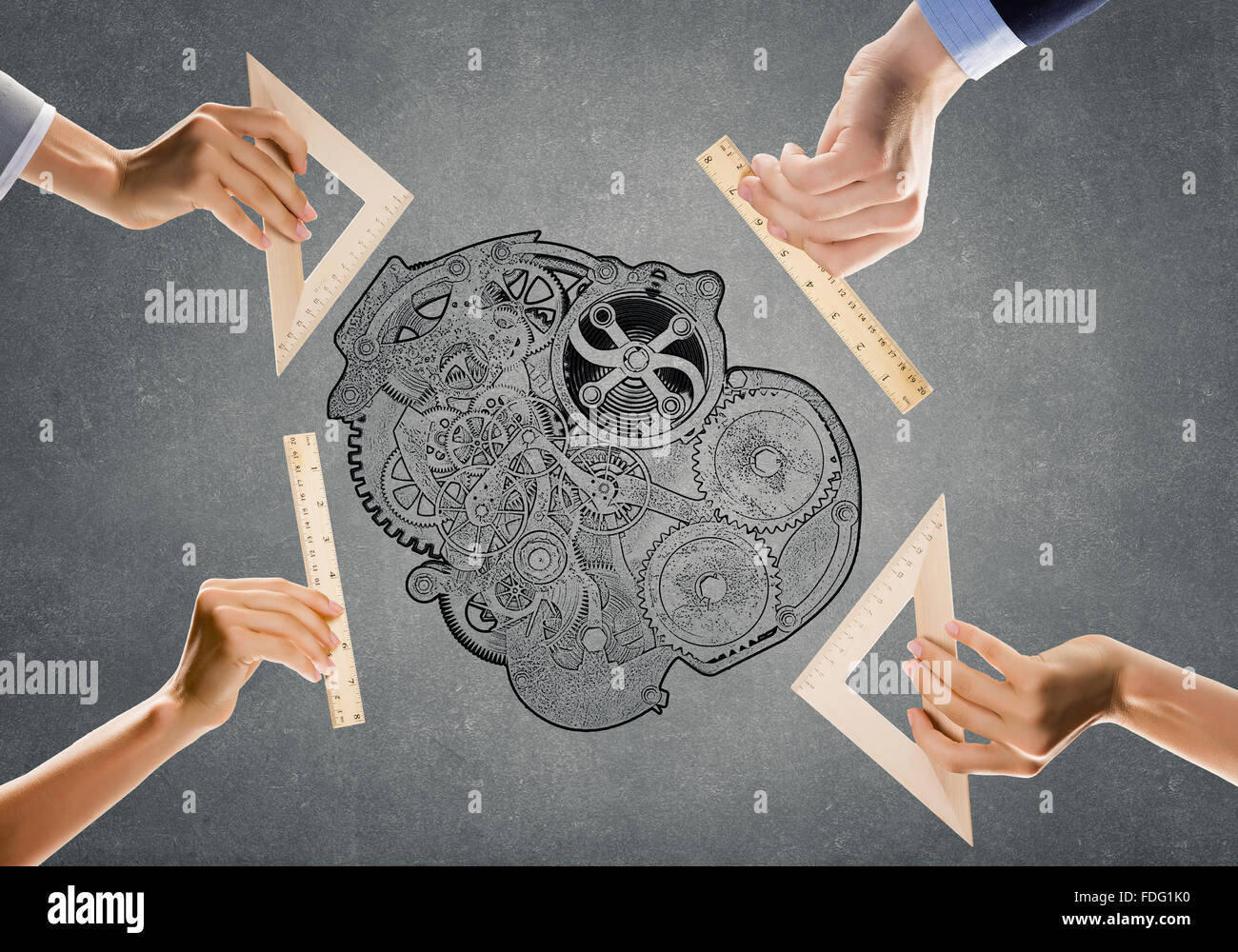 Human hands measuring gears mechanism with wooden rulers Stock Photo ...