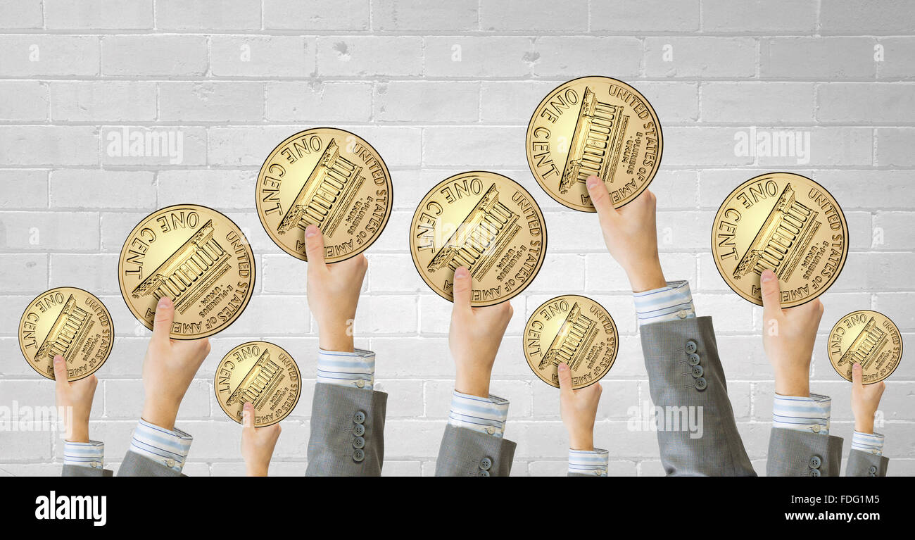 Crowd of people holding one cent coin Stock Photo - Alamy