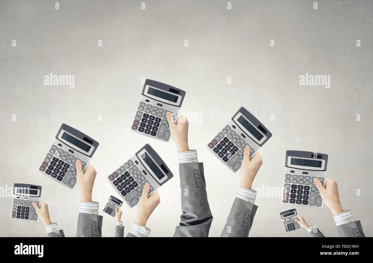 Many calculators hi-res stock photography and images - Alamy