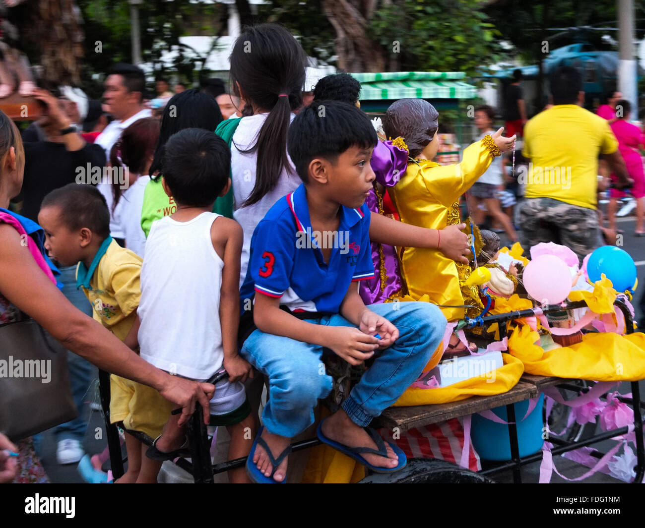 Manila, Philippines. 31st January, 2016. Kids in a sidecar with Sto ...