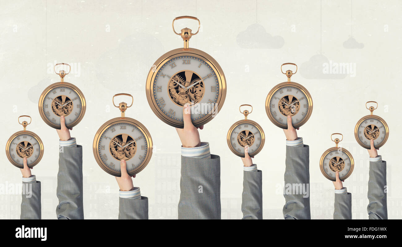 Many hands of business people holding pocket watch Stock Photo - Alamy