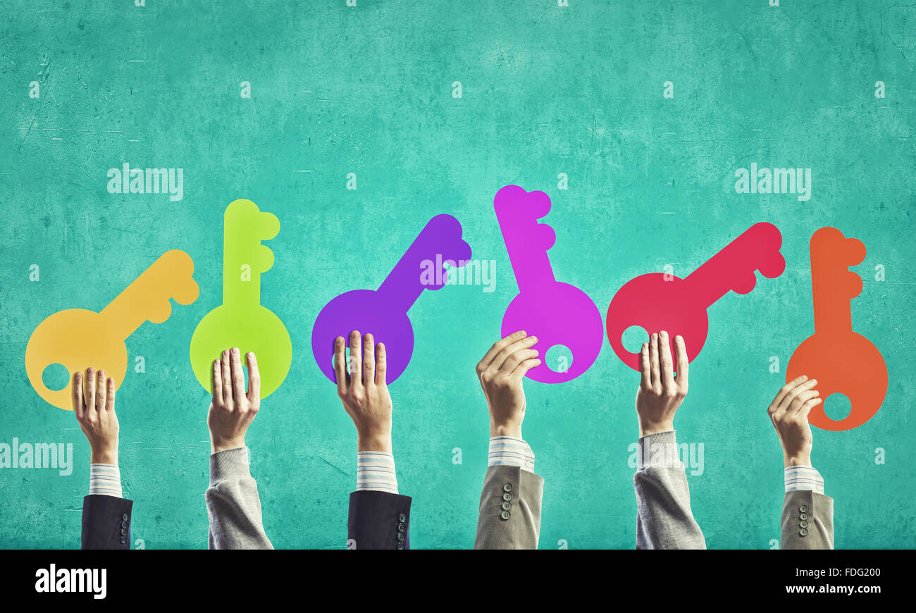 Many hands of business people holding keys Stock Photo - Alamy