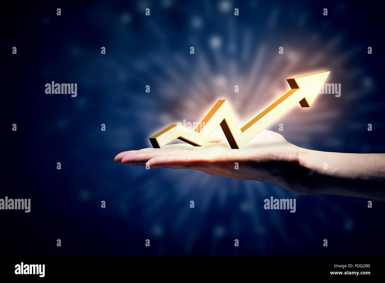 Hand holding rising arrow representing business growth Stock Photo - Alamy