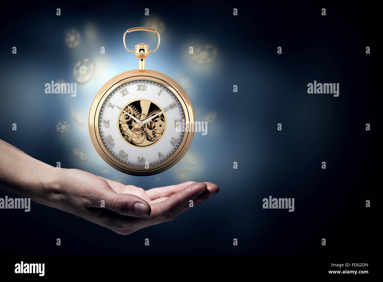 Close up image of human hand holding pocket watch Stock Photo - Alamy