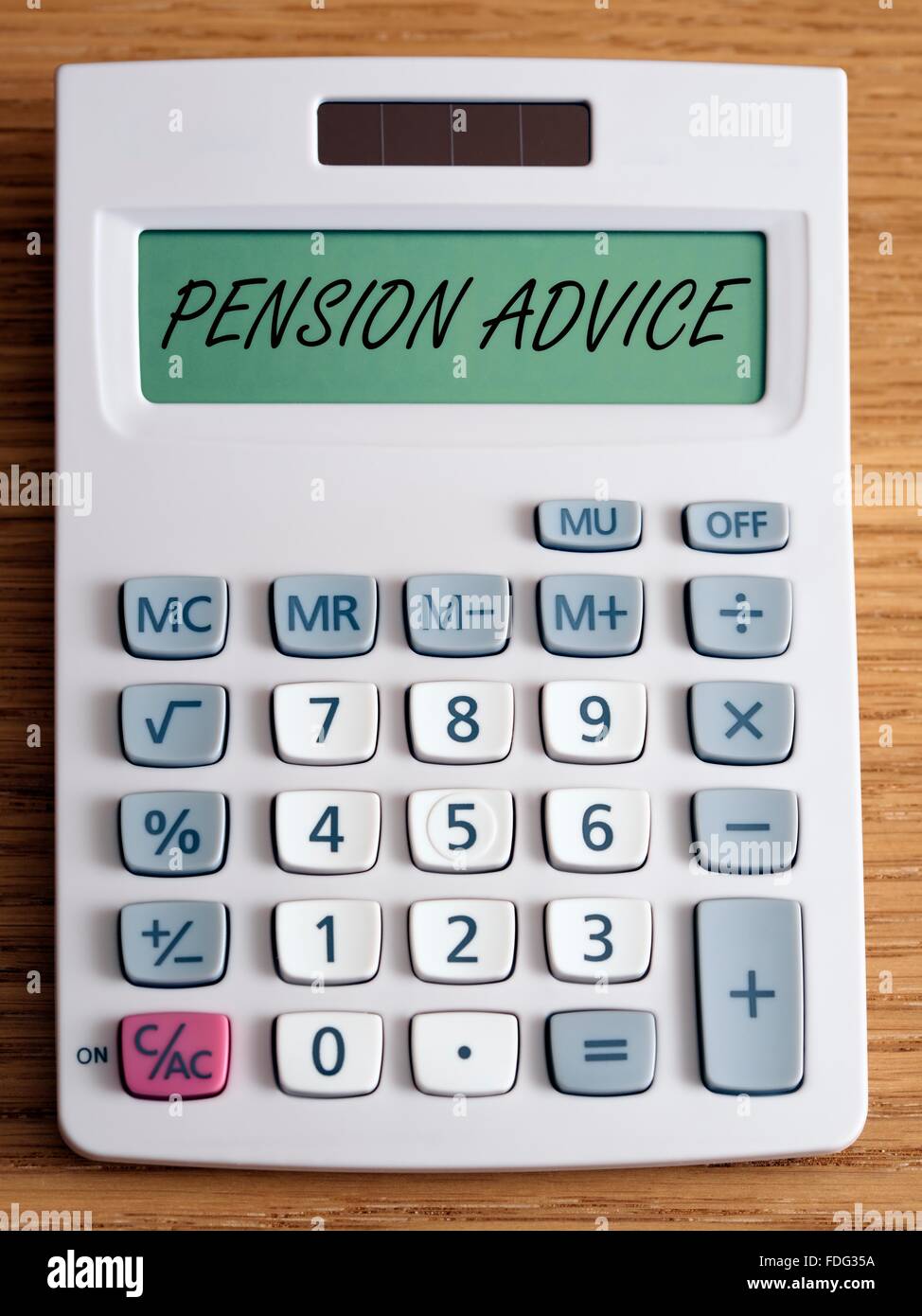 Pension advice on a calculator screen Stock Photo - Alamy