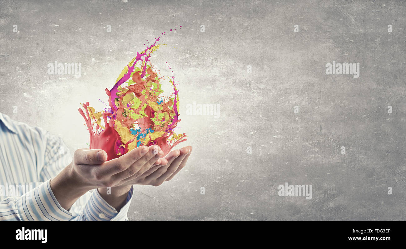 Male hands and paint splashes in palms Stock Photo - Alamy
