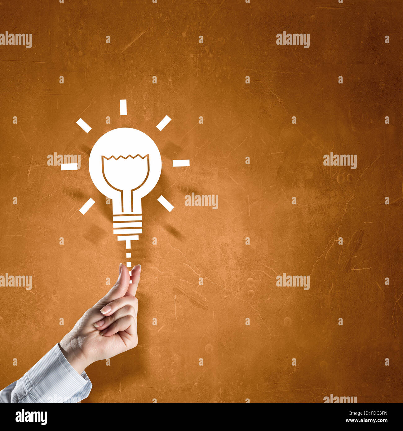 Close up of hand holding glowing light bulb Stock Photo - Alamy