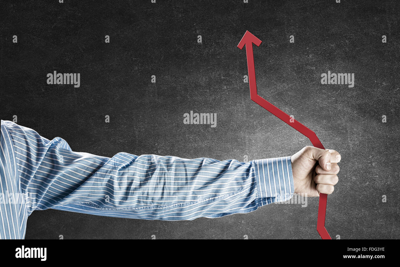 Hand showing power concept and growing graph Stock Photo - Alamy