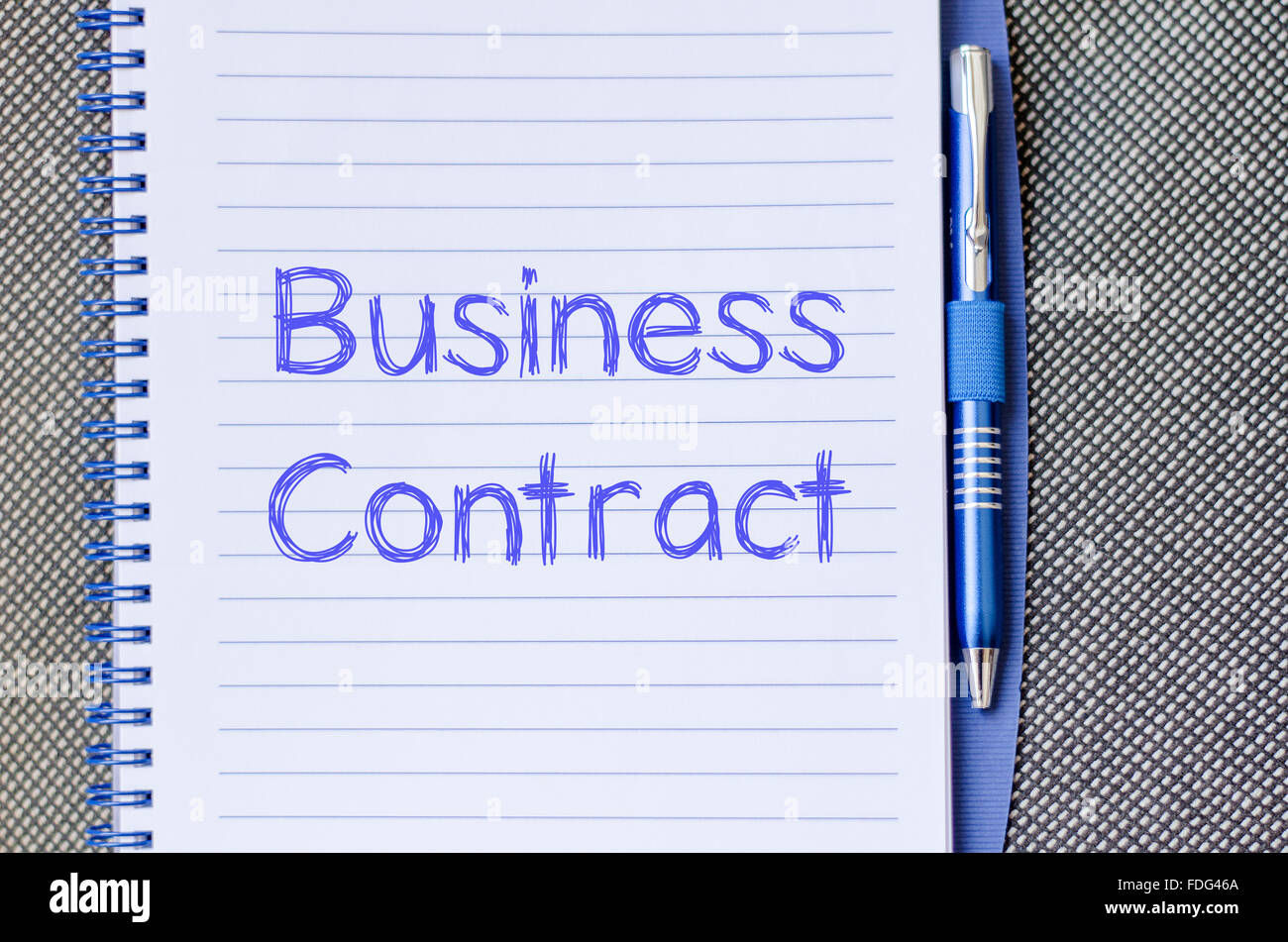 Business contract text concept write on notebook with pen Stock Photo ...