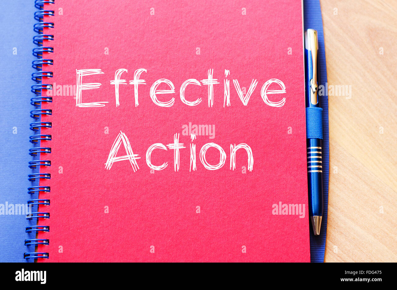 Effective action text concept write on notebook with pen Stock Photo ...