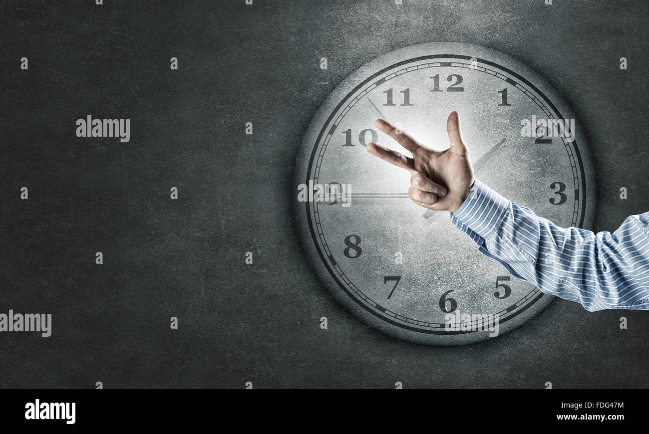 Hand of businessman showing finger gesture and time concept Stock Photo ...