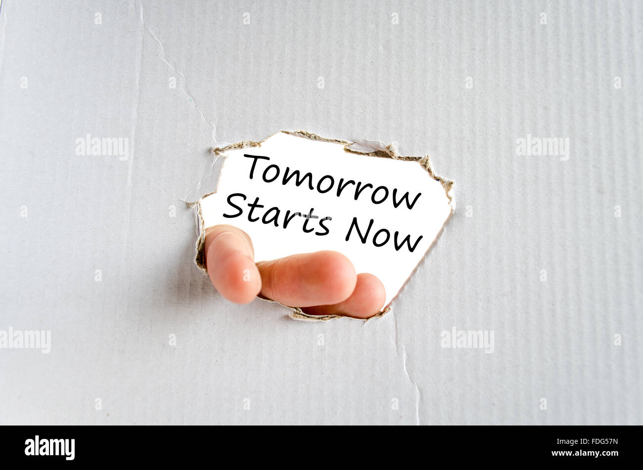 Tomorrow starts now text concept isolated over white background Stock ...
