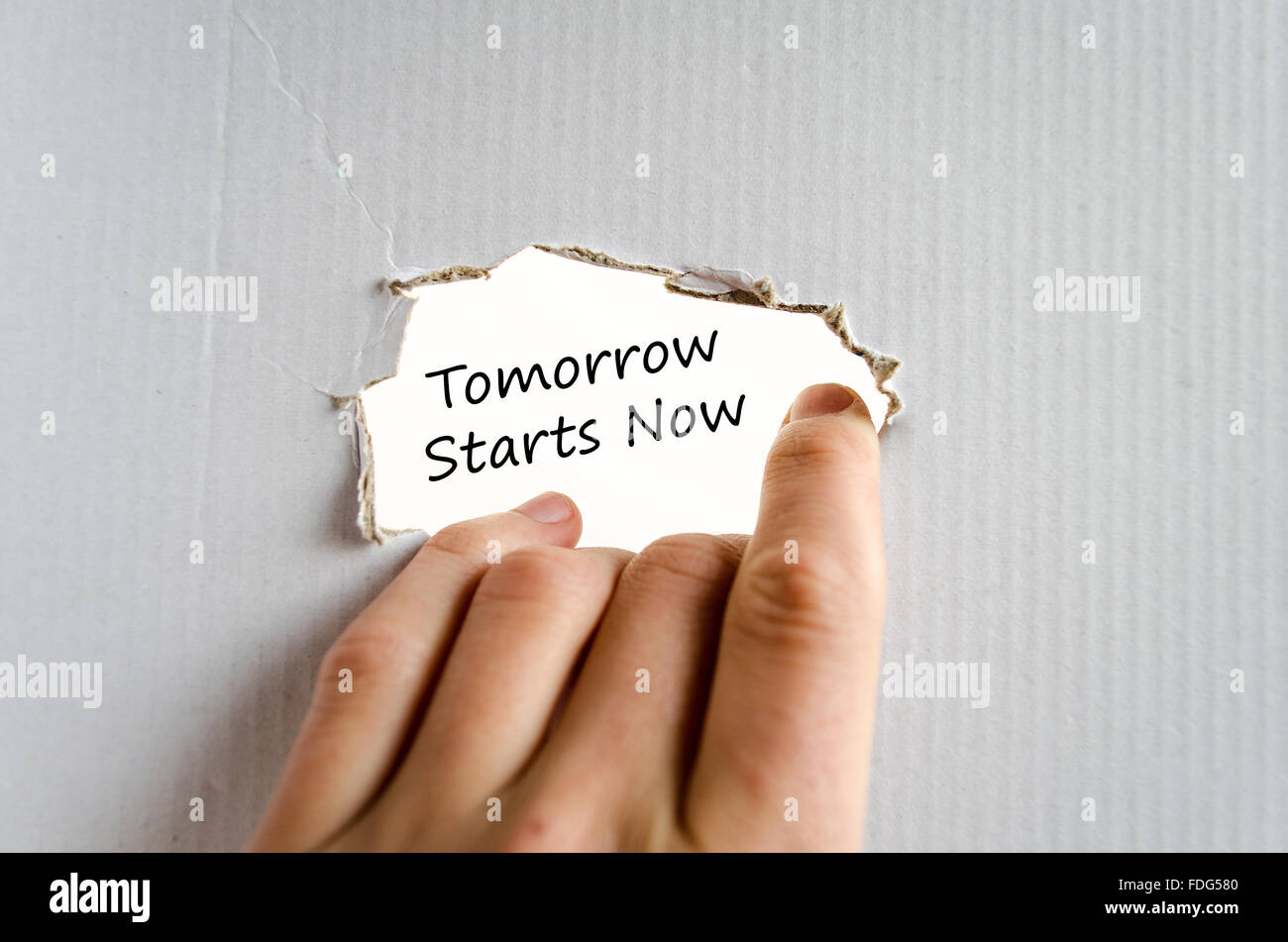 Tomorrow starts now text concept isolated over white background Stock ...