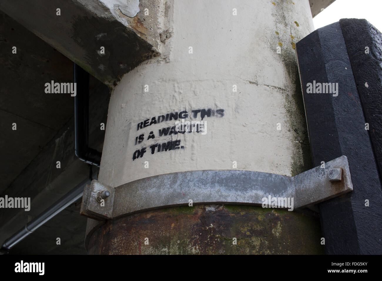 Graffiti on an upright of Prince of Wales pier, Falmouth Stock Photo ...