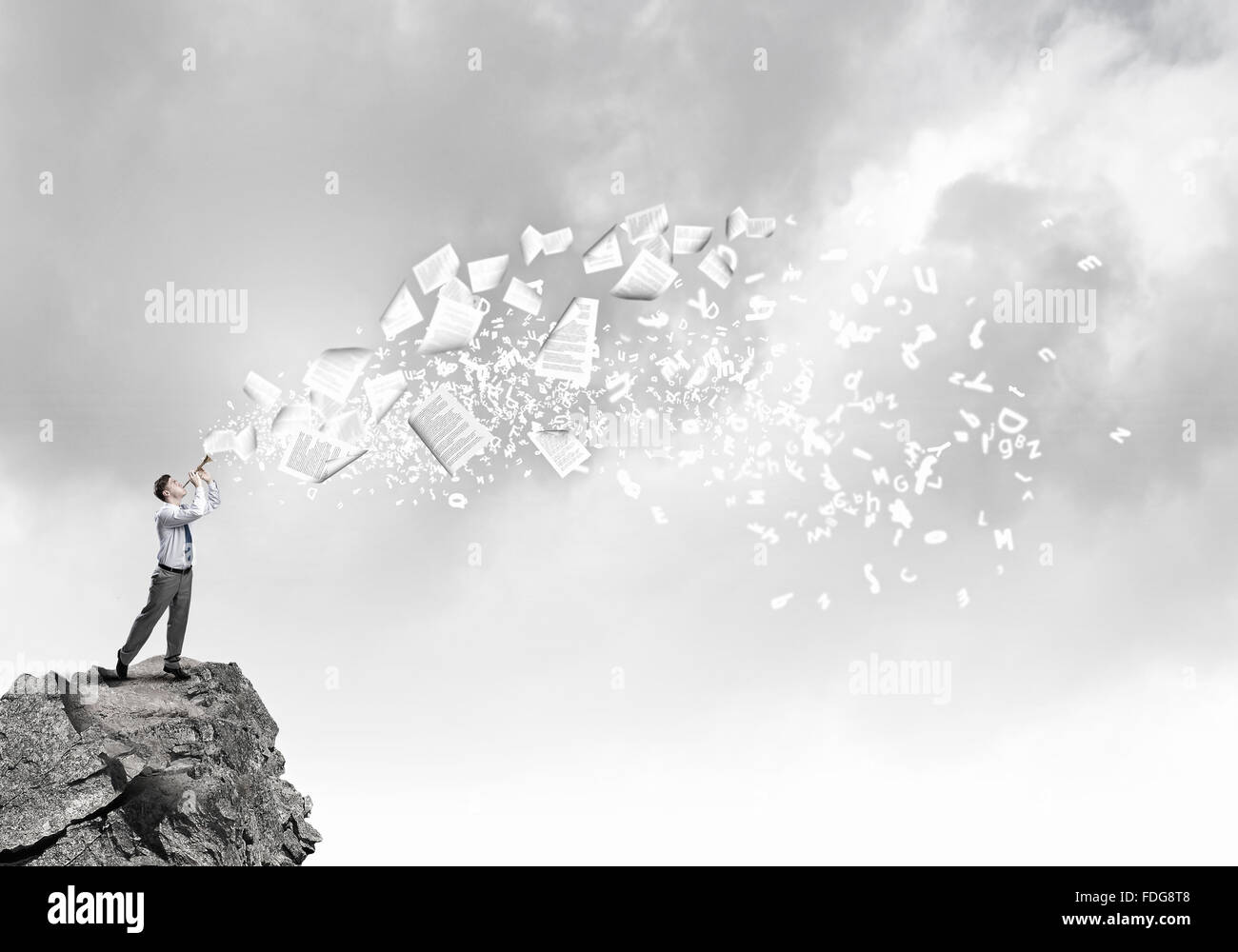 Young businessman playing flute and papers flying out Stock Photo - Alamy