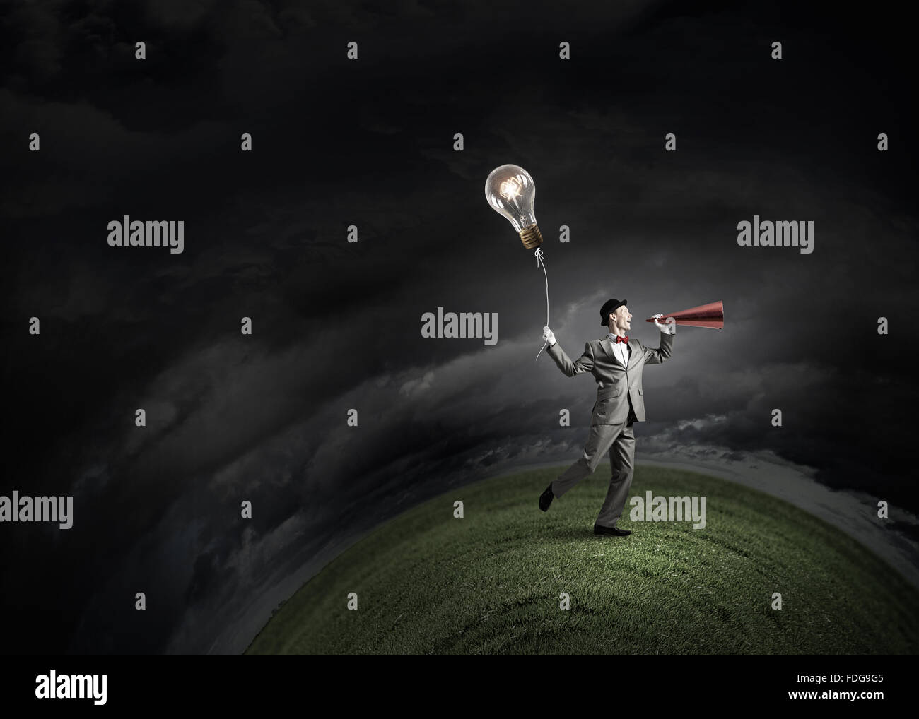 Young businessman screaming emotionally in paper trumpet Stock Photo ...