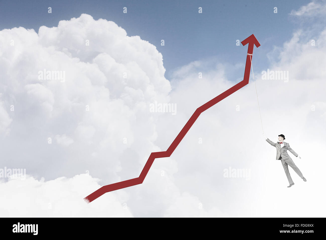 Businessman pulling arrow with rope and making it raise up Stock Photo ...