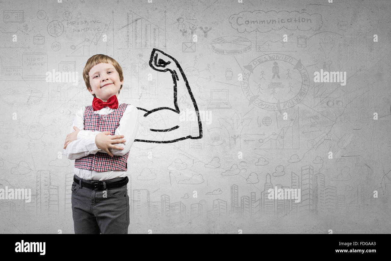 Portrait of little boy with hands folded on chest Stock Photo - Alamy