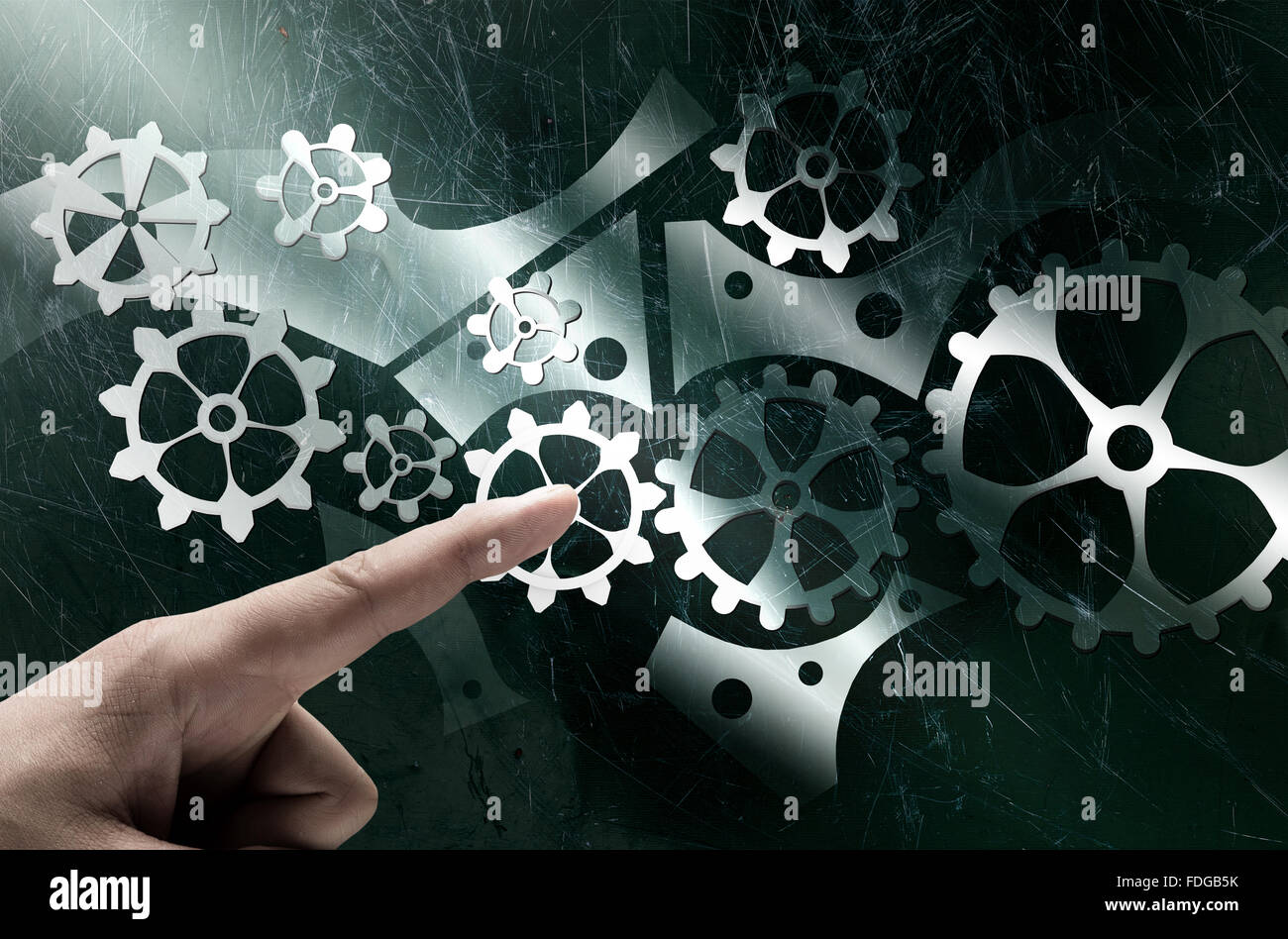 Close up human hand pointing with finger at gears mechanism Stock Photo ...