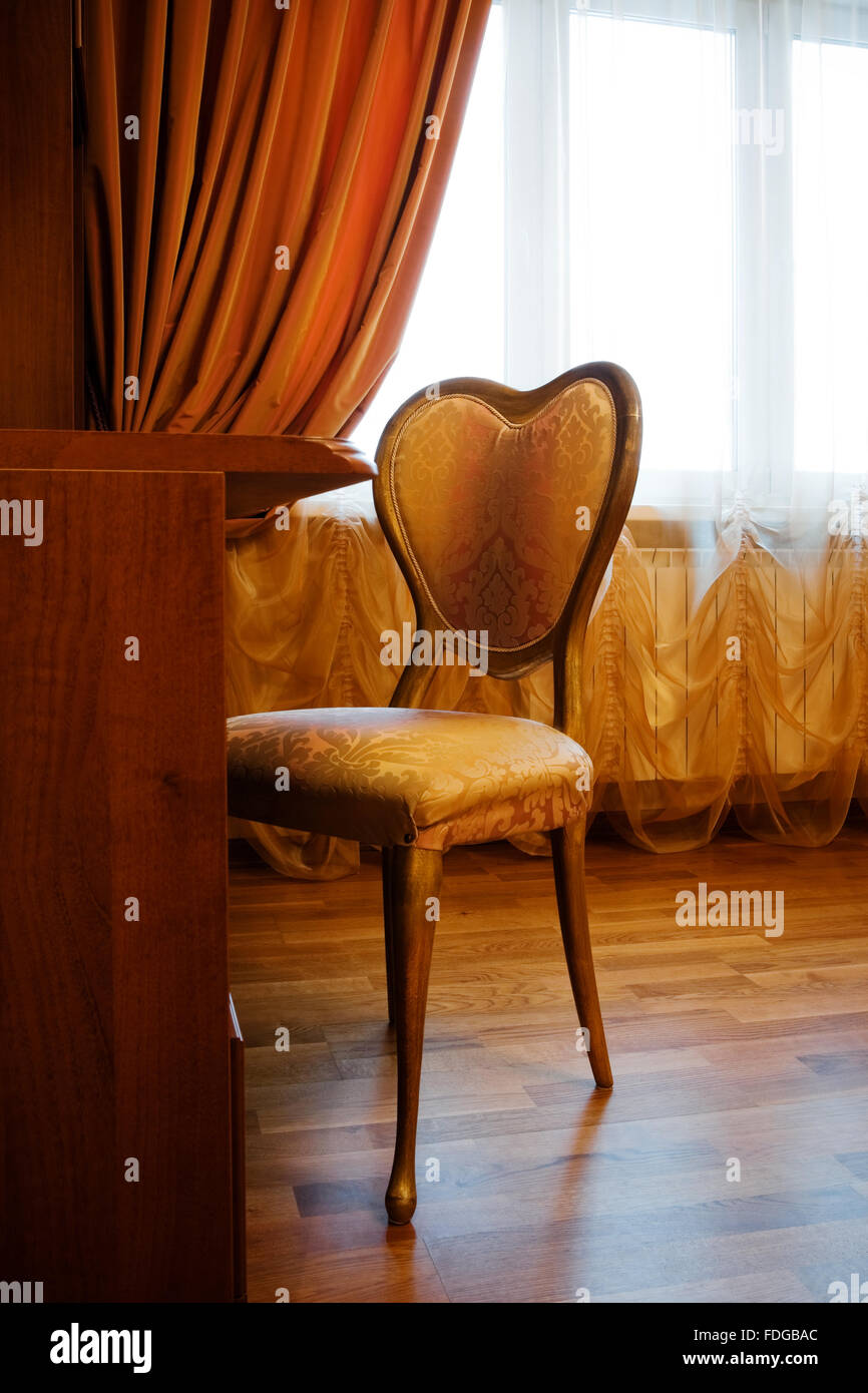 table and chair by the window in a modern apartment Stock Photo - Alamy